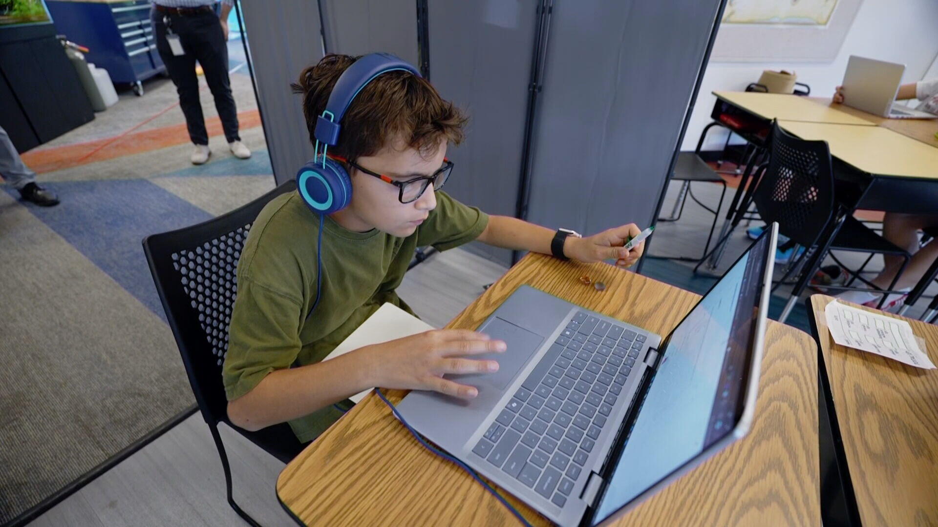 AI ban or fan? The debate over using generative AI in schools - CBS News
