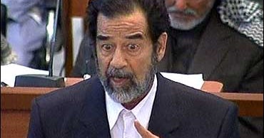 Saddam Claims Americans Beat Him - CBS News