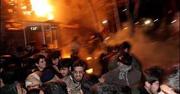 Cartoon Protests Flare In Iran - CBS News