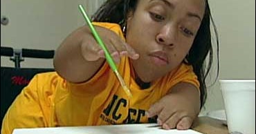 Monique Proves Size Isn't Everything - CBS News