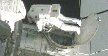 Shuttle Astronauts Begin Robot Assembly - CBS News