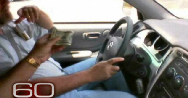 Spy Transaction Caught on Tape - CBS News