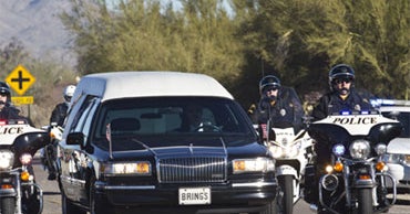 Solemn Funeral for Federal Judge in Tucson - CBS News