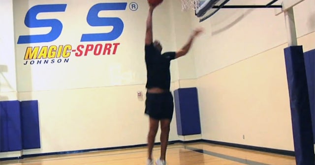 Ex-NBA star Marques Johnson, 55, dunks over car (sort of) - CBS News