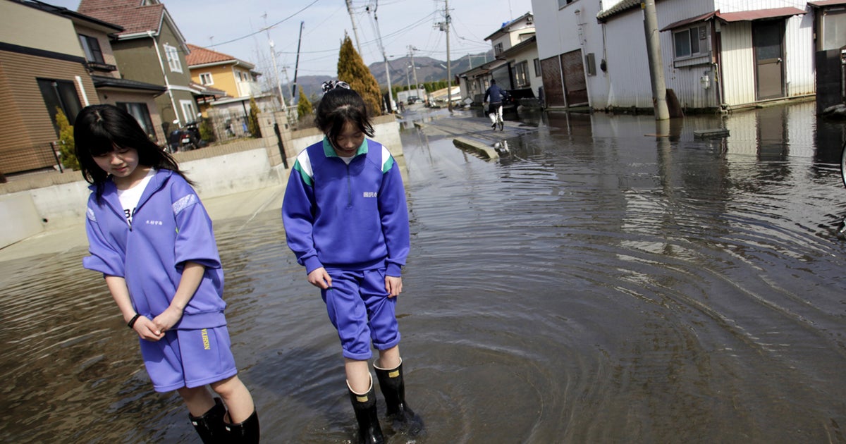 Japanese towns flood daily after quake "sunk" land - CBS News