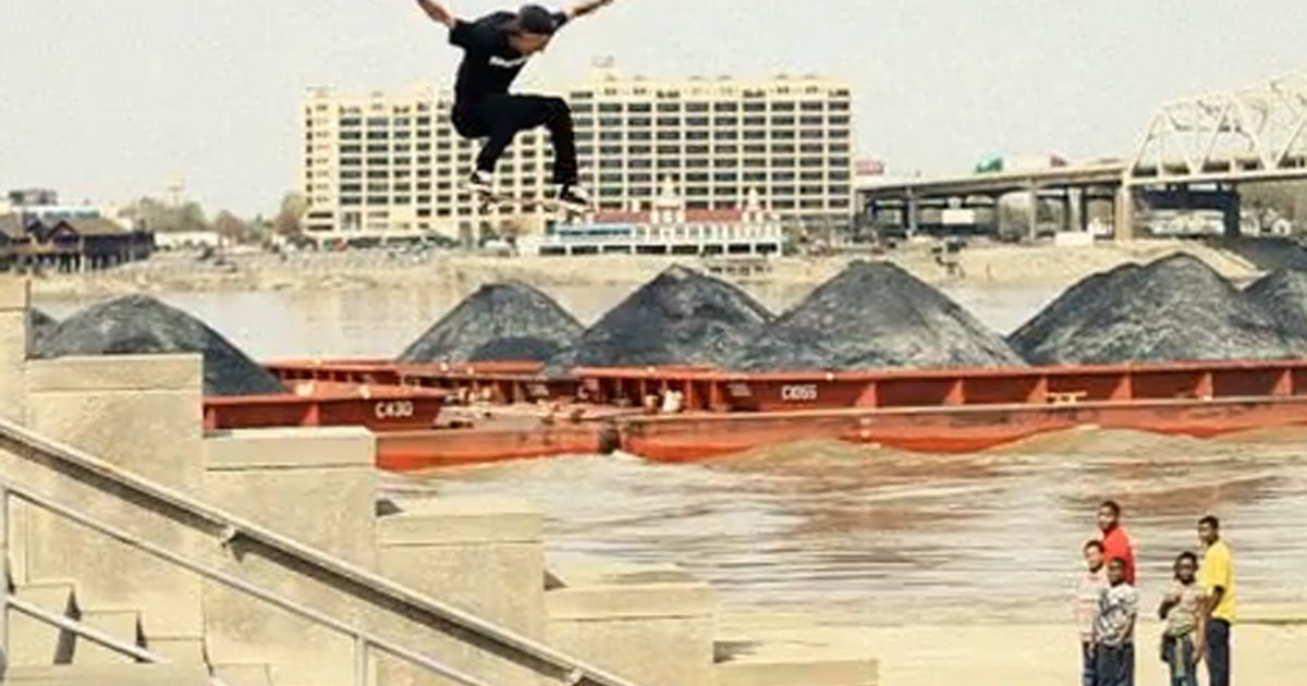 Skateboarder Aaron Homoki performs amazing ollie - CBS News