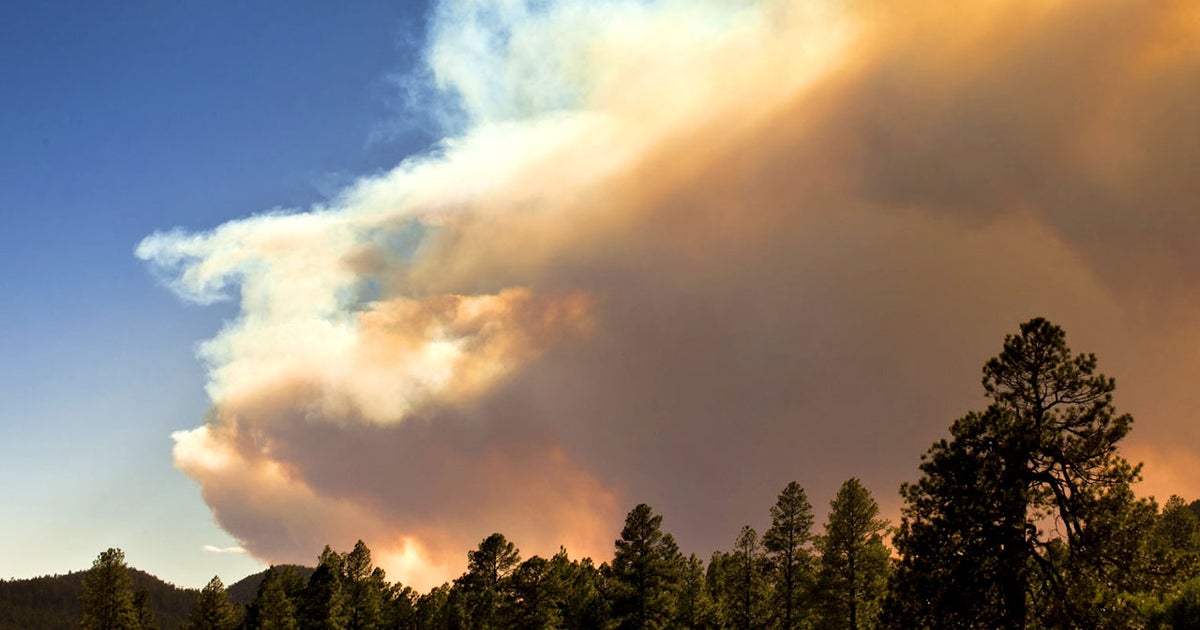 More evacuations as Arizona wildfire spreads - CBS News