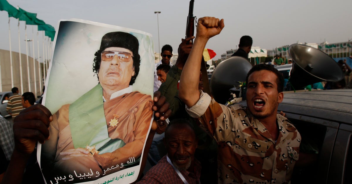 Qaddafi vows to fight to death amid NATO strikes - CBS News