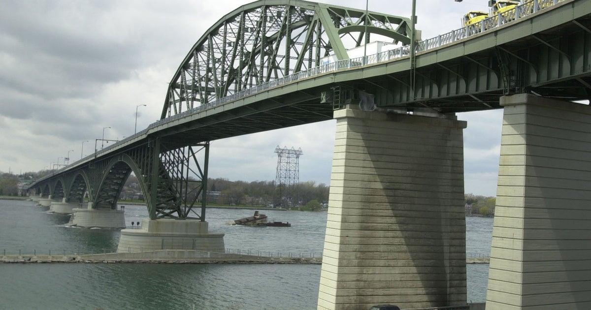 Woman survives 100-ft plunge off Buffalo bridge - CBS News