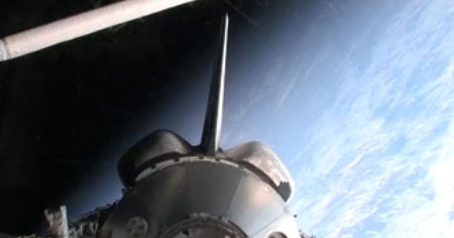 Atlantis docks at International Space Station - CBS News