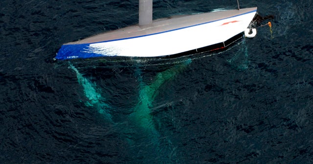 Lake Michigan capsize kills 2 boaters in race - CBS News