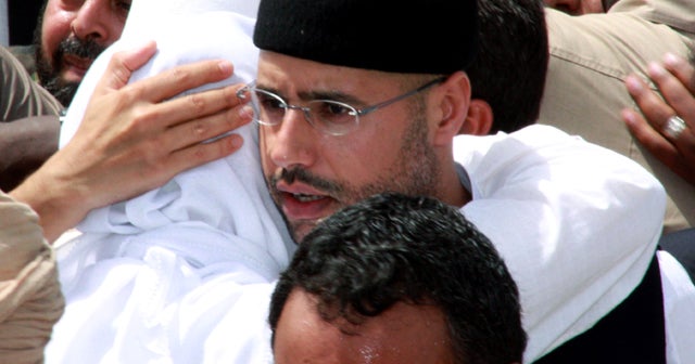 Qaddafi son vows to fight to death, says dad OK - CBS News