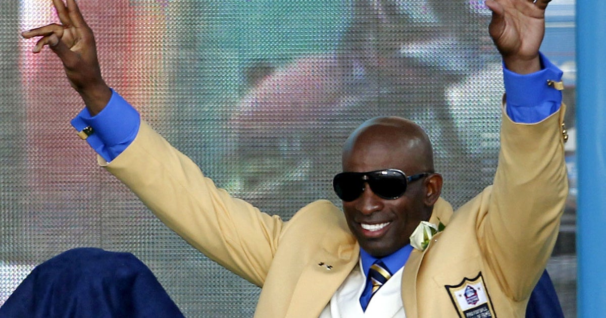 Deion Sanders, other stars join football HOF - CBS News