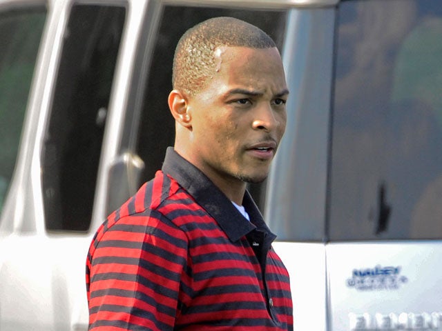Rapper T.I. released from prison one month early - CBS News