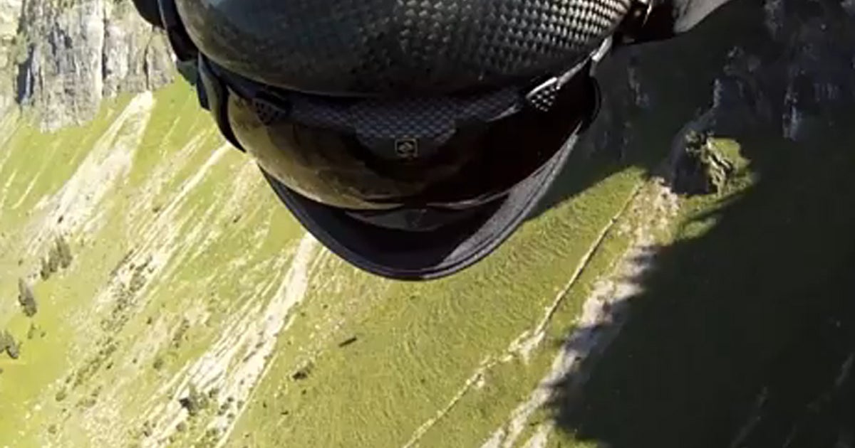 Jeb Corliss blows us away again with his amazing aerial acrobatics ...