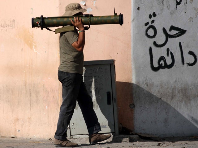 Qaddafi's deserted missiles prompt looting fears - CBS News