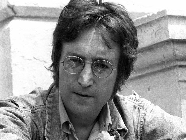 John Lennon's tooth sells for more than $31,000 - CBS News