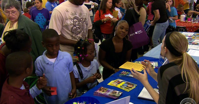 Community comes together for homeless families - CBS News