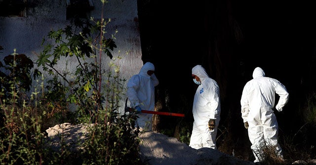 5 bodies found in Mexican student group HQ - CBS News