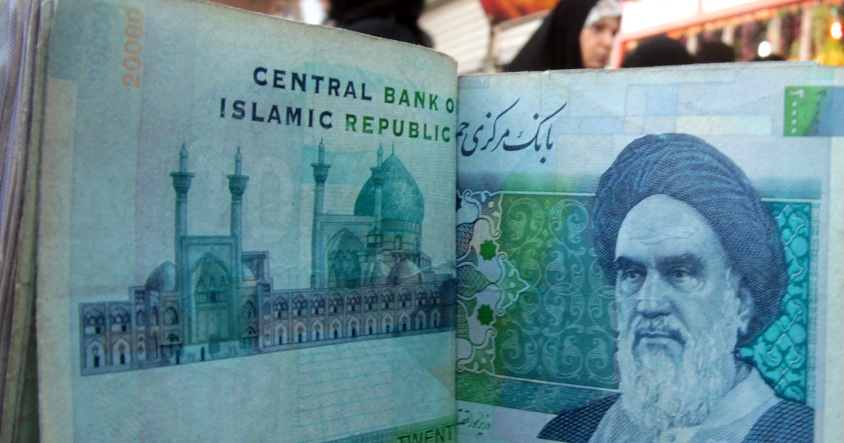 Global banking hub cuts ties with Iranian banks - CBS News