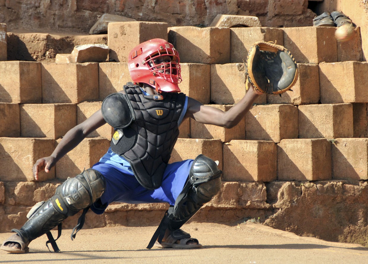 Ugandan children's new favorite sport: Baseball - CBS News