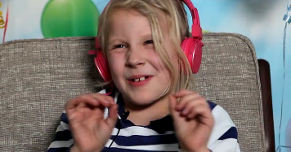 Very young rock journalist conducts interview like a pro - CBS News