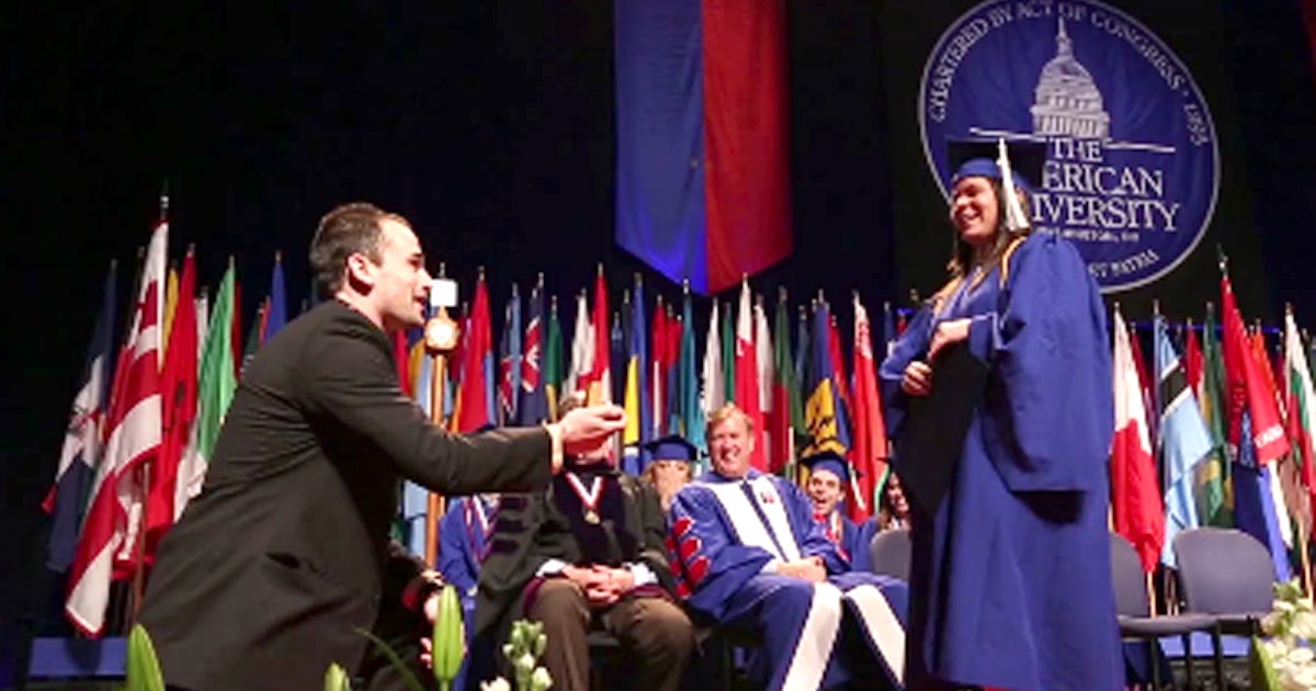 Surprise wedding proposal at American University graduation - CBS News