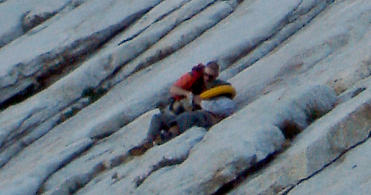 Quick-thinking deputy saves hiker stuck on ledge - CBS News