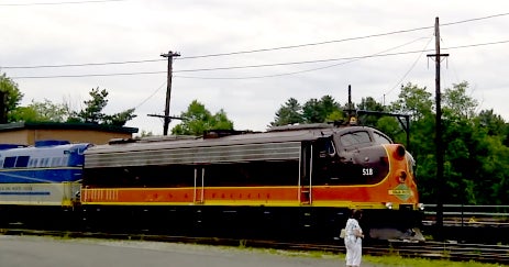 Watch this man get very excited about seeing a train - CBS News