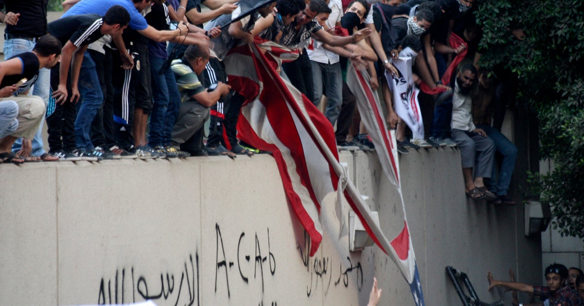 Egypt protesters scale U.S. Embassy wall, take flag - CBS News