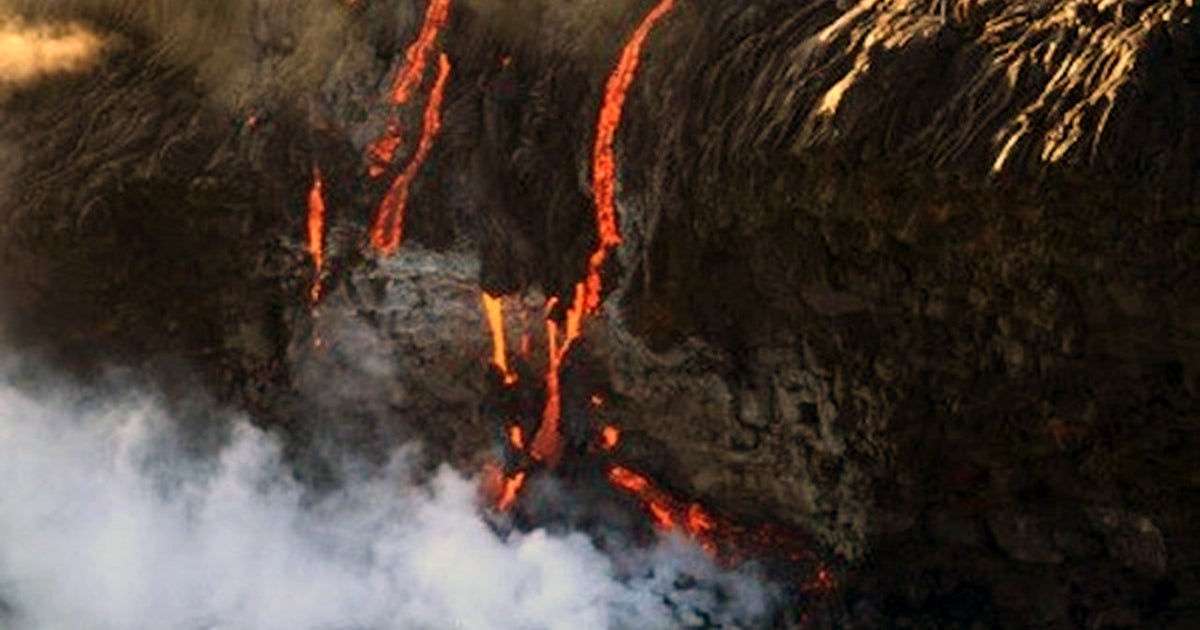 Watch: Fiery lava spills into Pacific ocean - CBS News