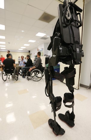 Robotic suit enables paraplegics to walk
