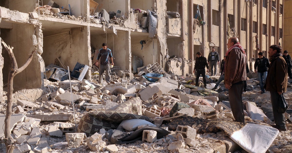 Dozens killed in twin blasts at university in Aleppo, Syrian activists say - CBS News