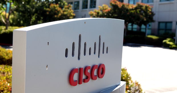 Cisco raises dividend 21% - CBS News