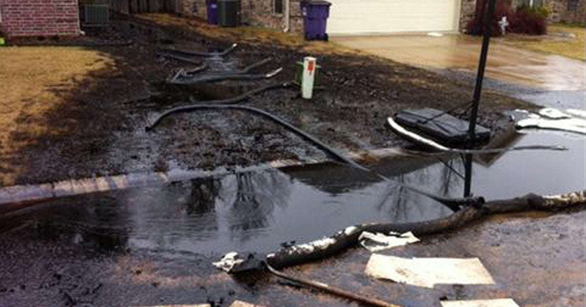 Homes evacuated after ExxonMobil oil pipeline spill in Arkansas - CBS News