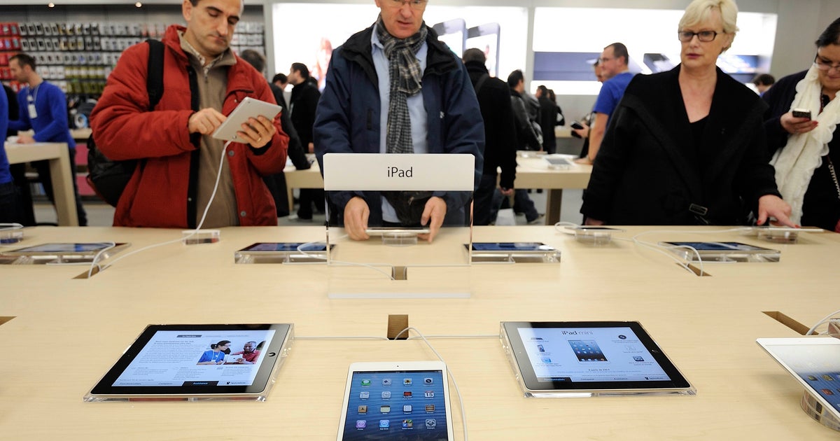 Apple: Falling margins, bigger dividend - CBS News