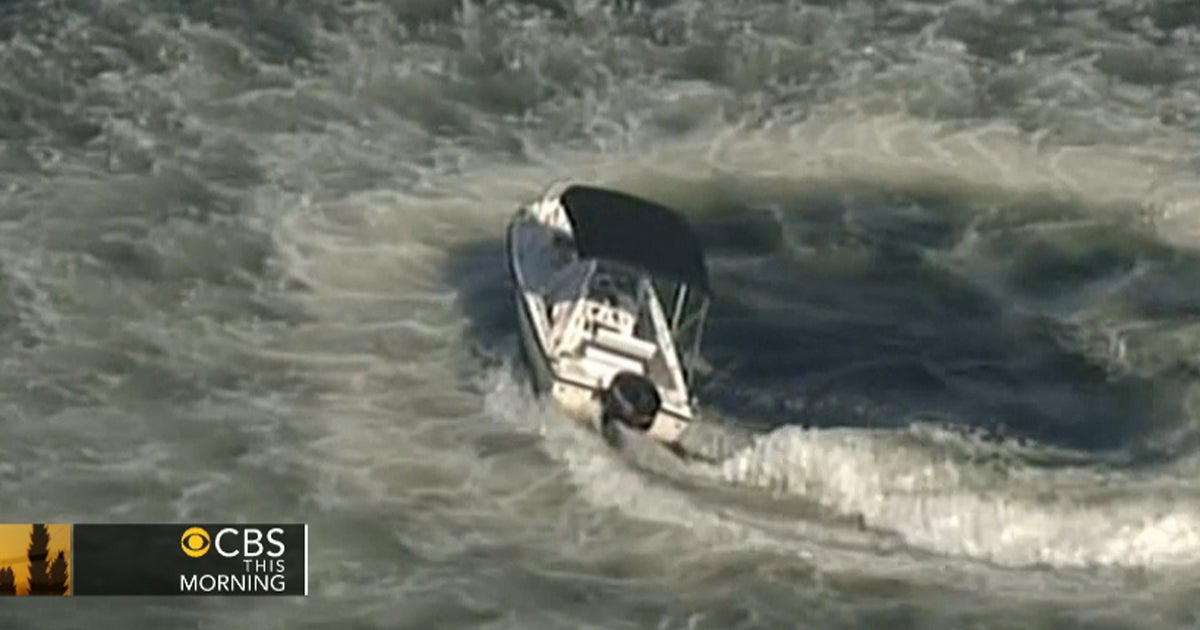Driverless boat circles after passengers tossed in wave - CBS News
