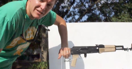 Slow motion of an AK-47 (in air and underwater) - CBS News