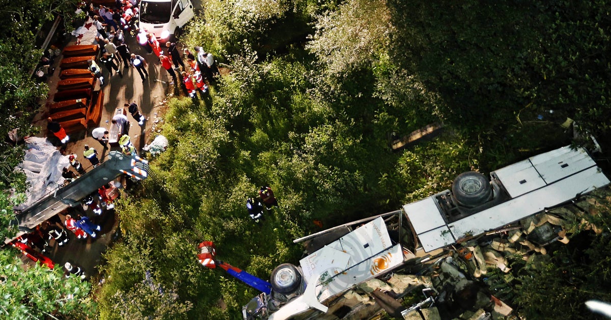 Tour bus plunges into Italian ravine, killing at least 38 - CBS News