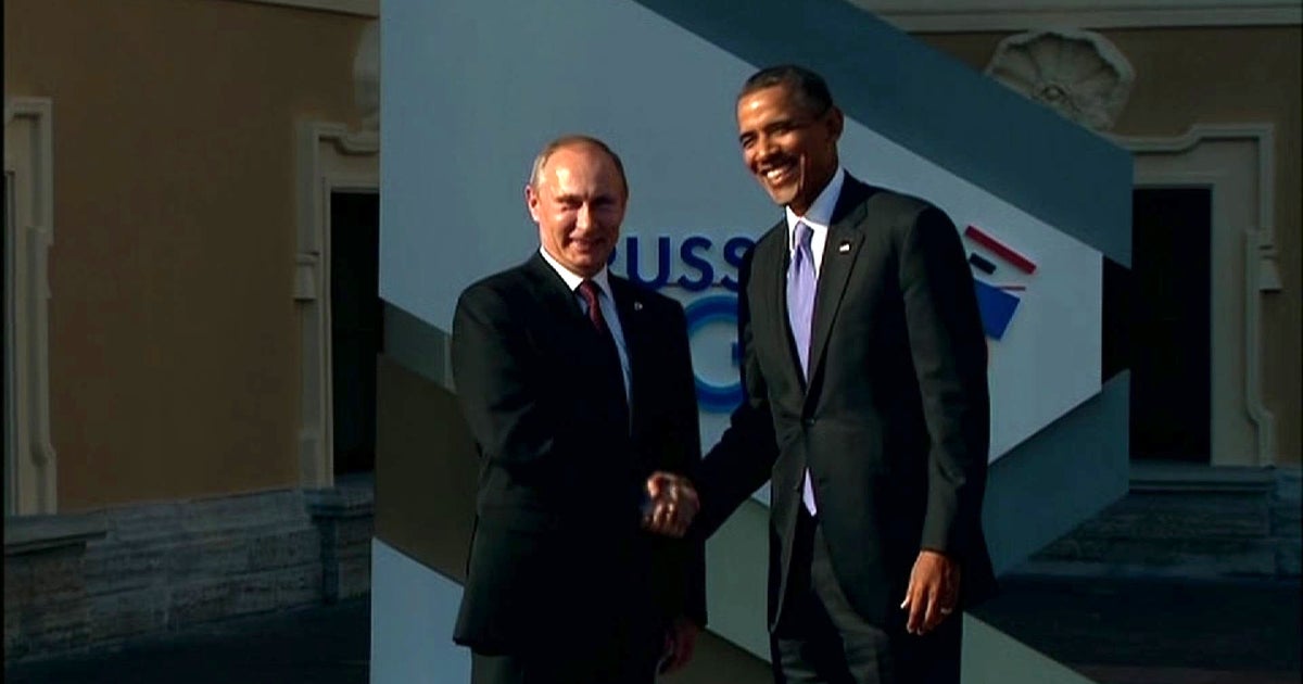 Obama and Putin shake hands - CBS News