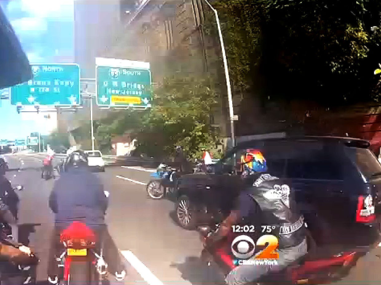 NYPD undercover officer arrested in SUV-motorcycle gang attack - CBS News