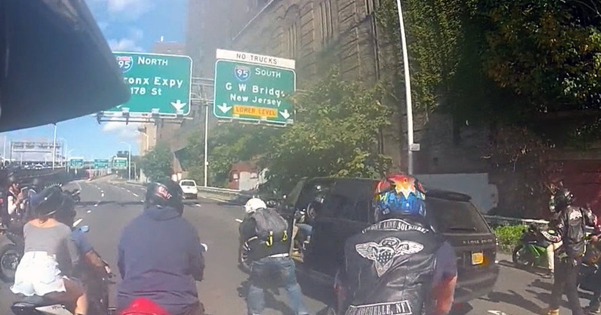 Watch: Biker gang chases, beats SUV driver in NYC - CBS News