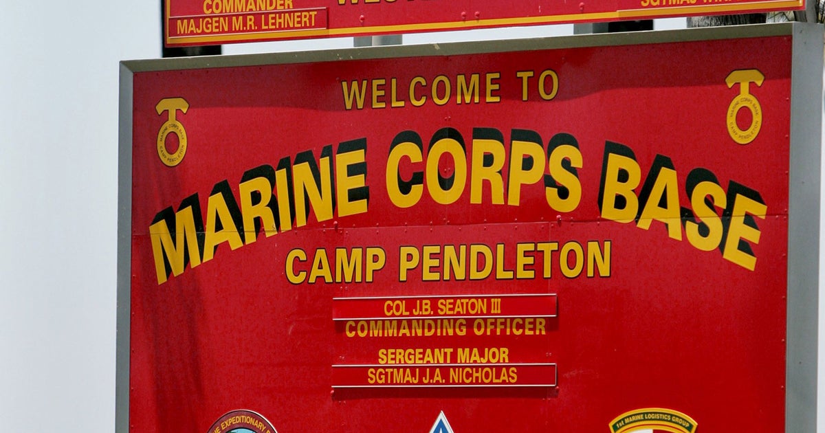 Marines investigated for Facebook gun photo taunting gays - CBS News