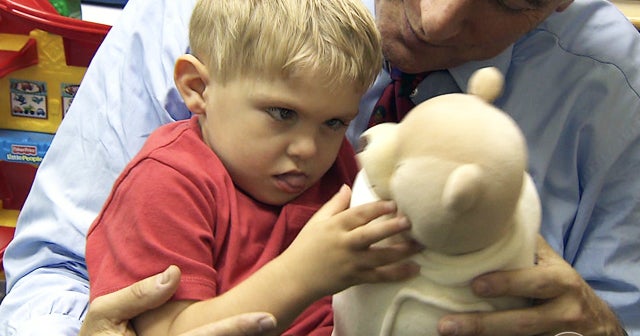 Little Grayson makes progress with auditory implant - CBS News