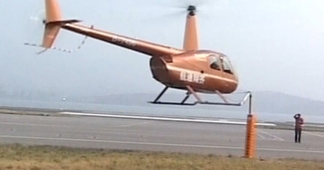 Watch: Helicopter opens beer bottle - CBS News