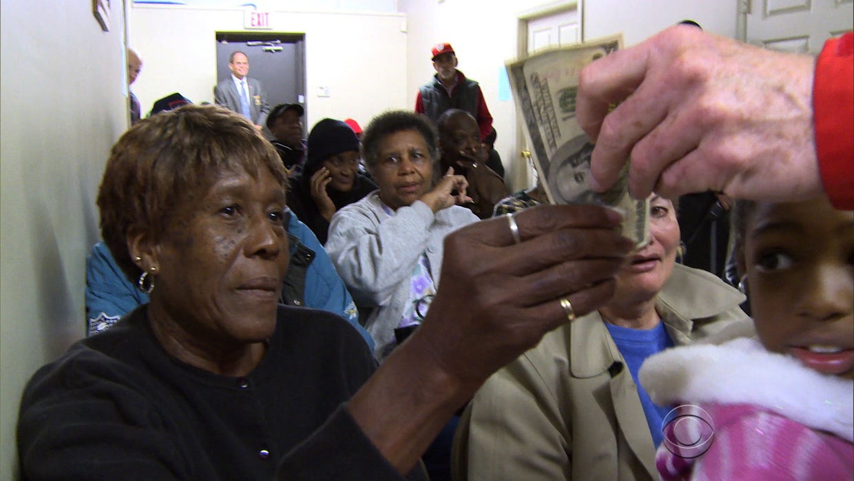 Real-life Santa brings special surprise across America - CBS News