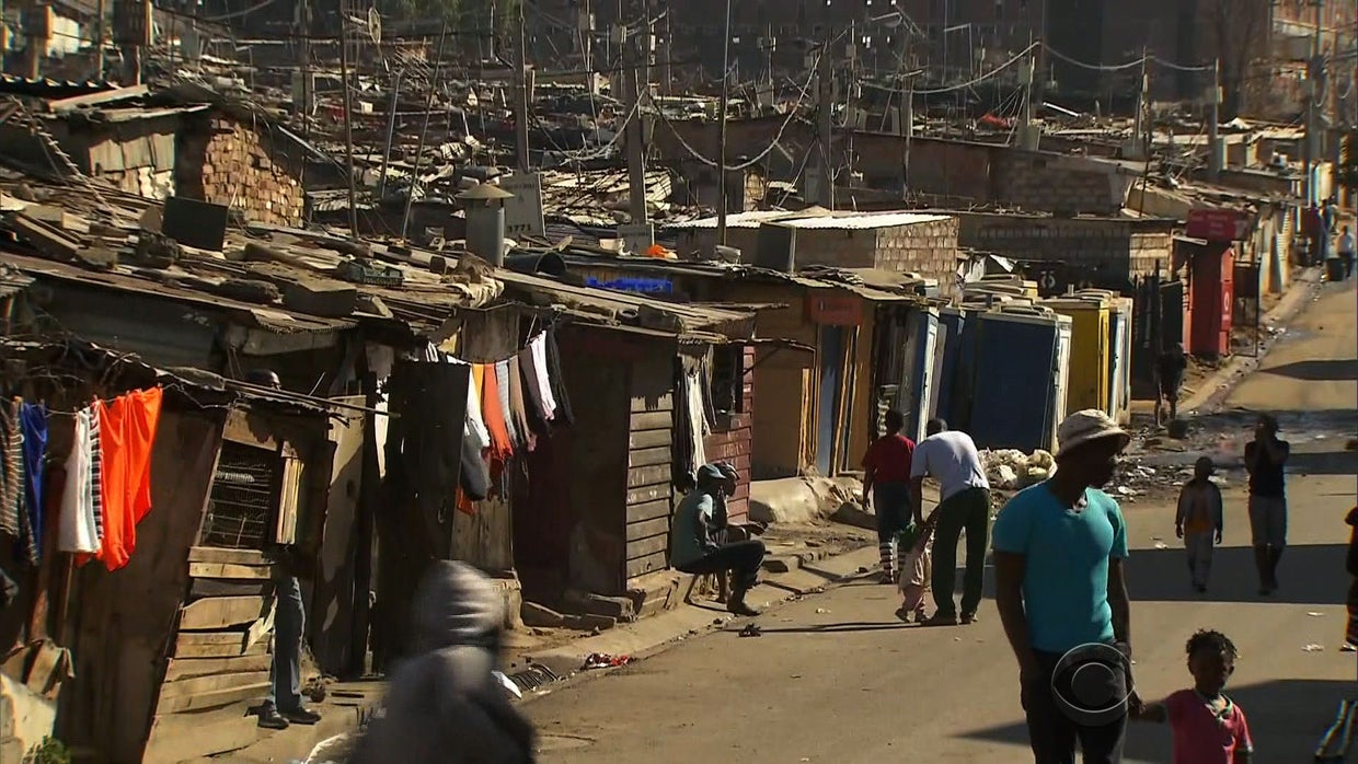 The township of Mandela's youth still struggles with squalor - CBS News