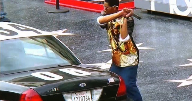Watch: Man smashes cop car windows - CBS News Watch: Man smashes cop car windows - CBS News