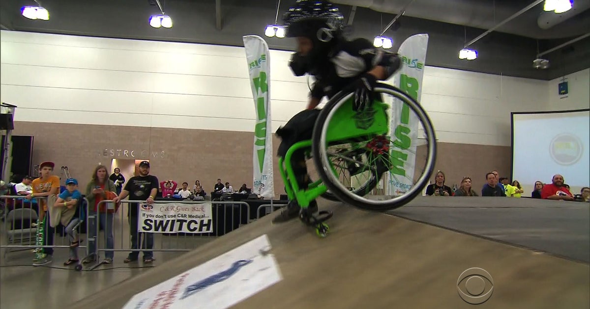 Extreme athlete taking wheelchair to new heights - CBS News