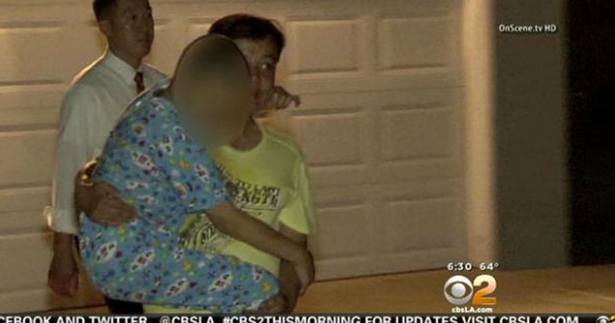 Parents arrested for allegedly keeping autistic son, 11, in cage in ...
